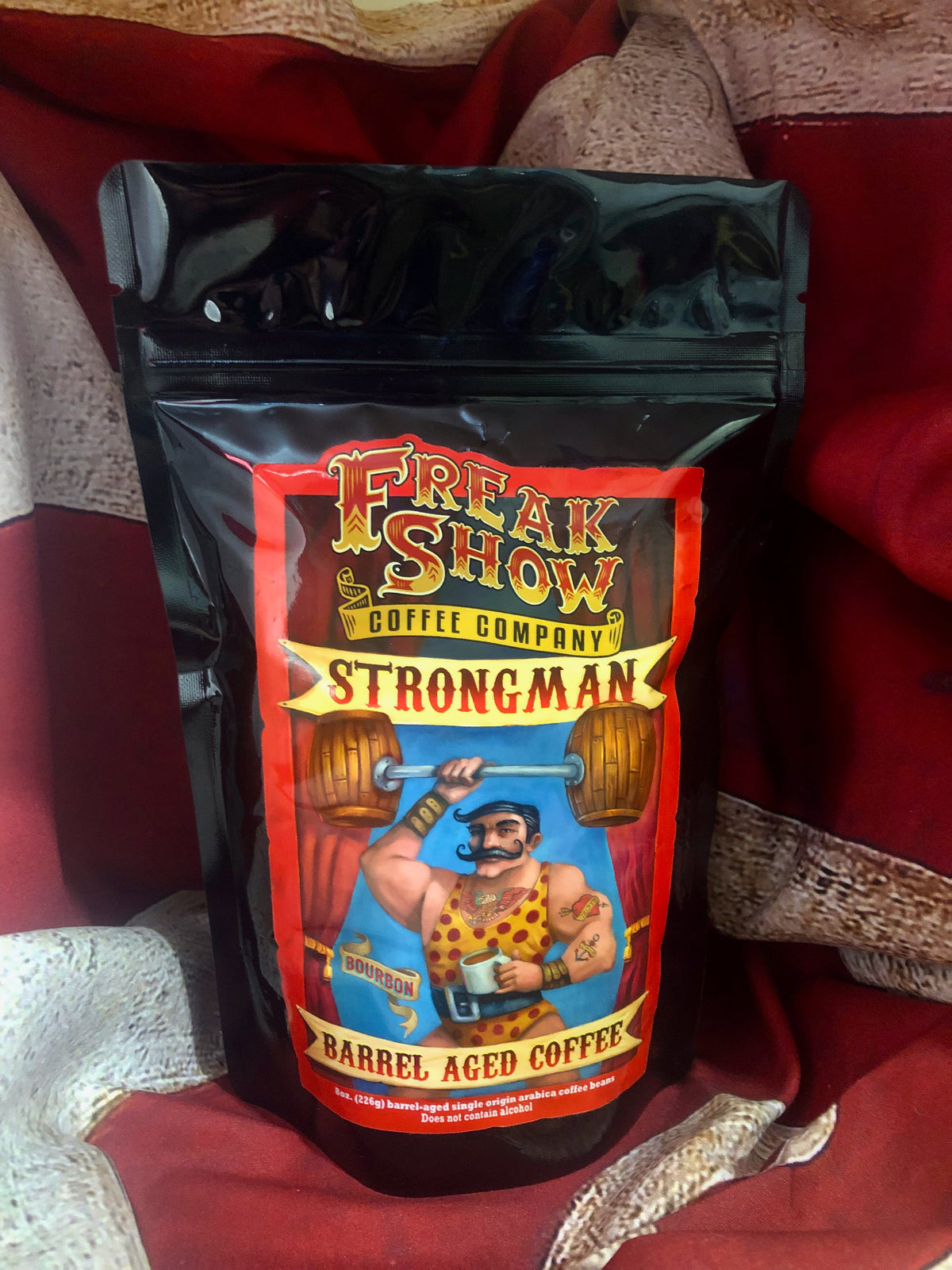 Strongman - Bourbon Barrel Aged Coffee | Freak Show Coffee Company